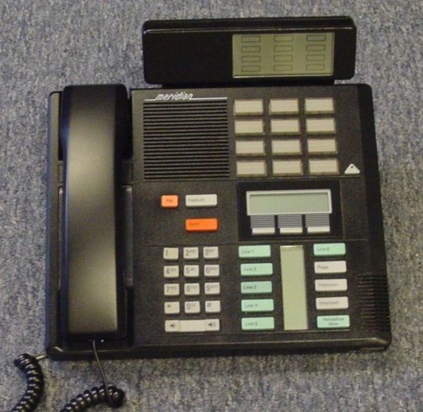 Norstar M7310 Phone with BLF Add-on Yellowed